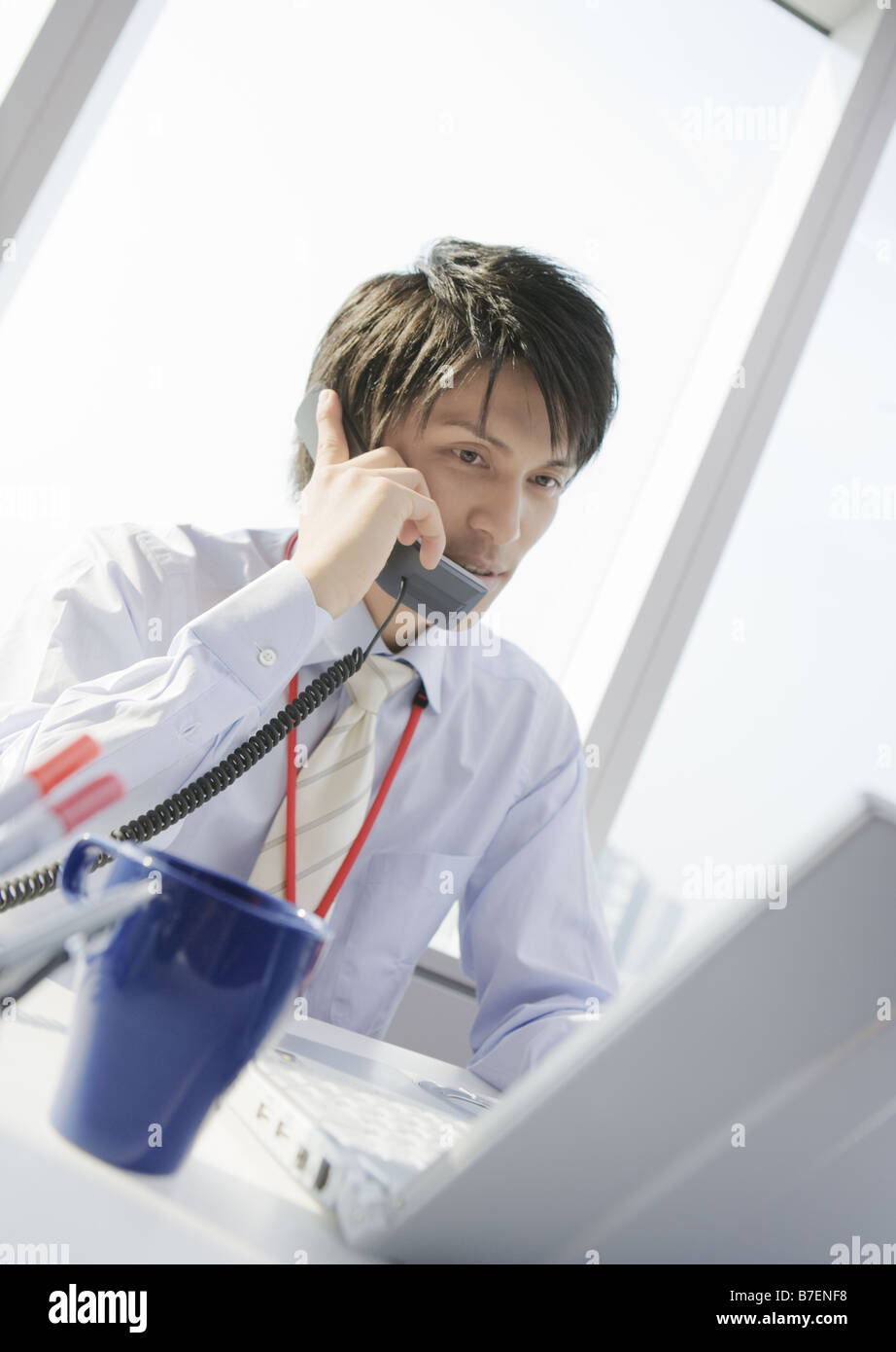Talking on a telephone hi-res stock photography and images - Alamy