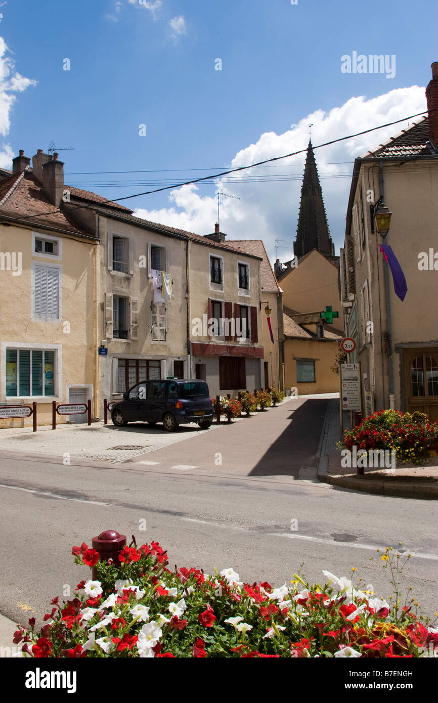 Nolay France with roadside flowers on display Stock Photo - Alamy