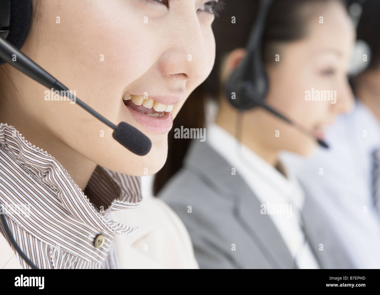 Call center operators in headset hi-res stock photography and images ...