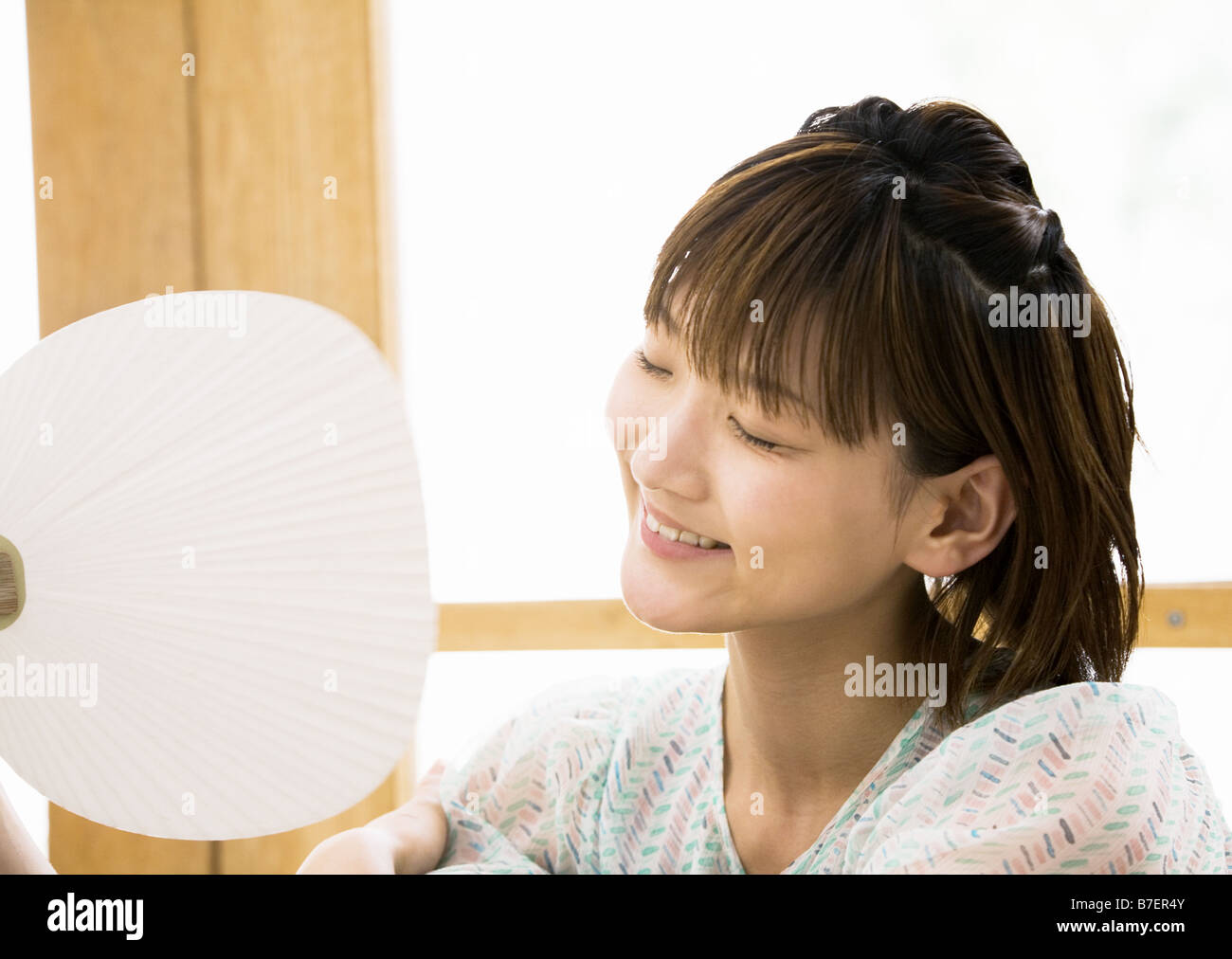 Woman paper fan cool hi-res stock photography and images - Alamy