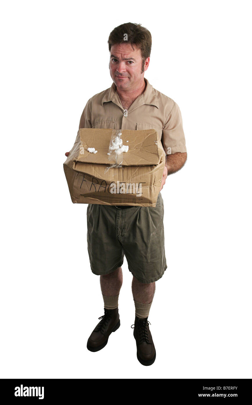 A delivery man holding a smashed package and looking apologetic Full ...