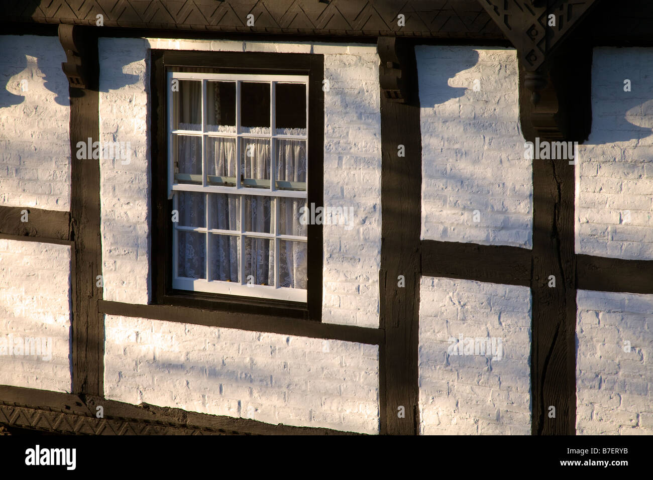 early morning sun on tudor house Stock Photo - Alamy