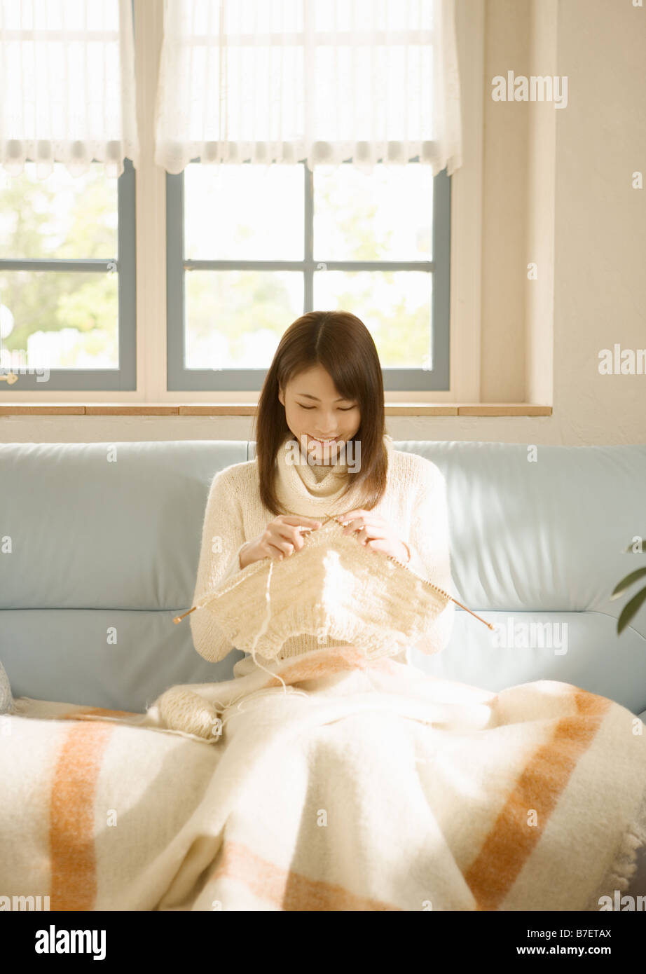 A woman knitting Stock Photo - Alamy