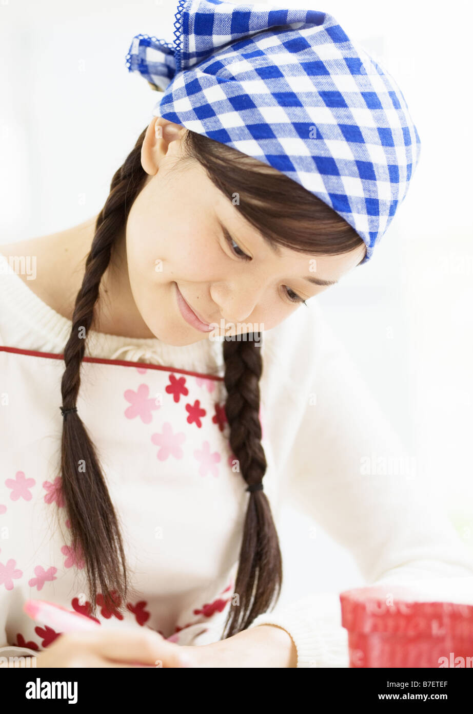 A woman writing a message Stock Photo - Alamy
