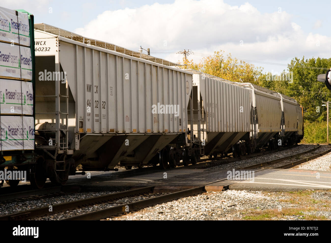 Railroad Freight Cars being switched across grade crossing at White ...