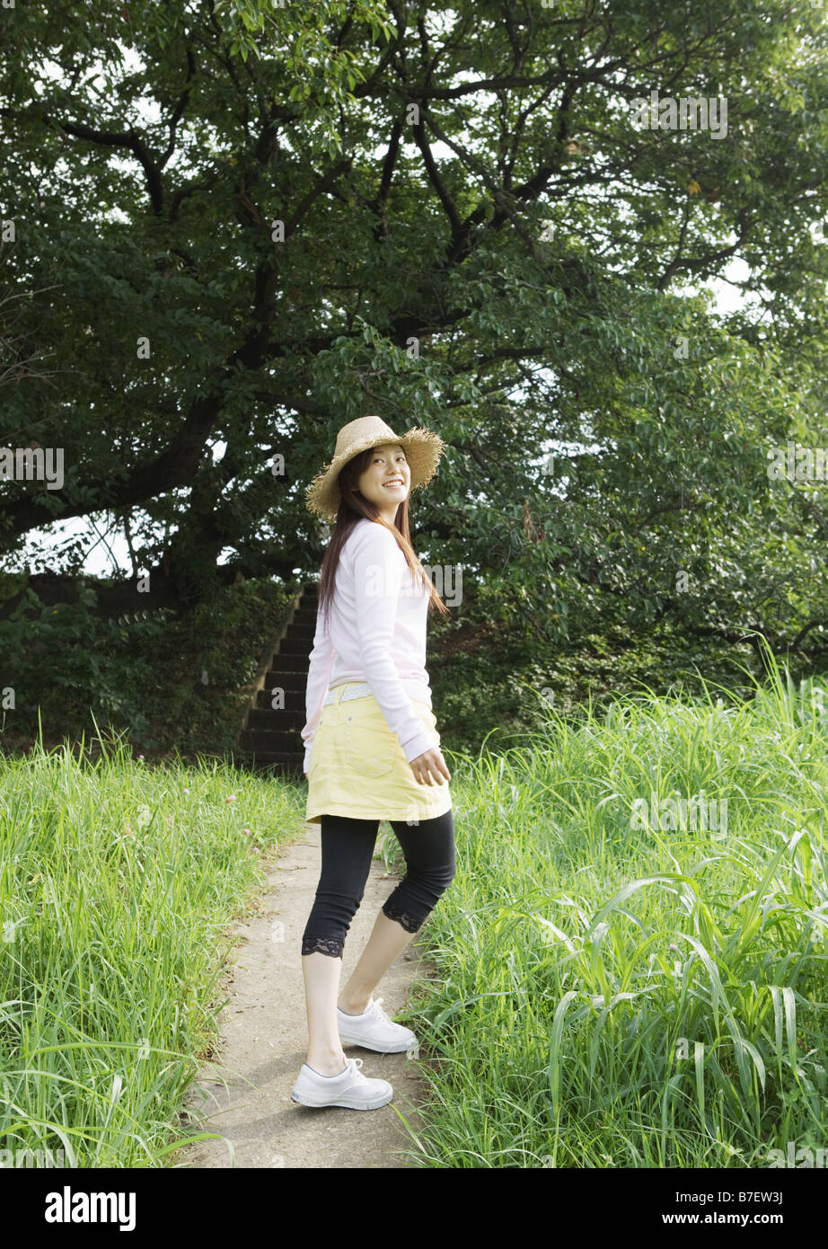 A woman taking a walk Stock Photo - Alamy