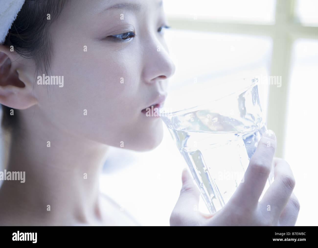 A woman drinking water Stock Photo - Alamy