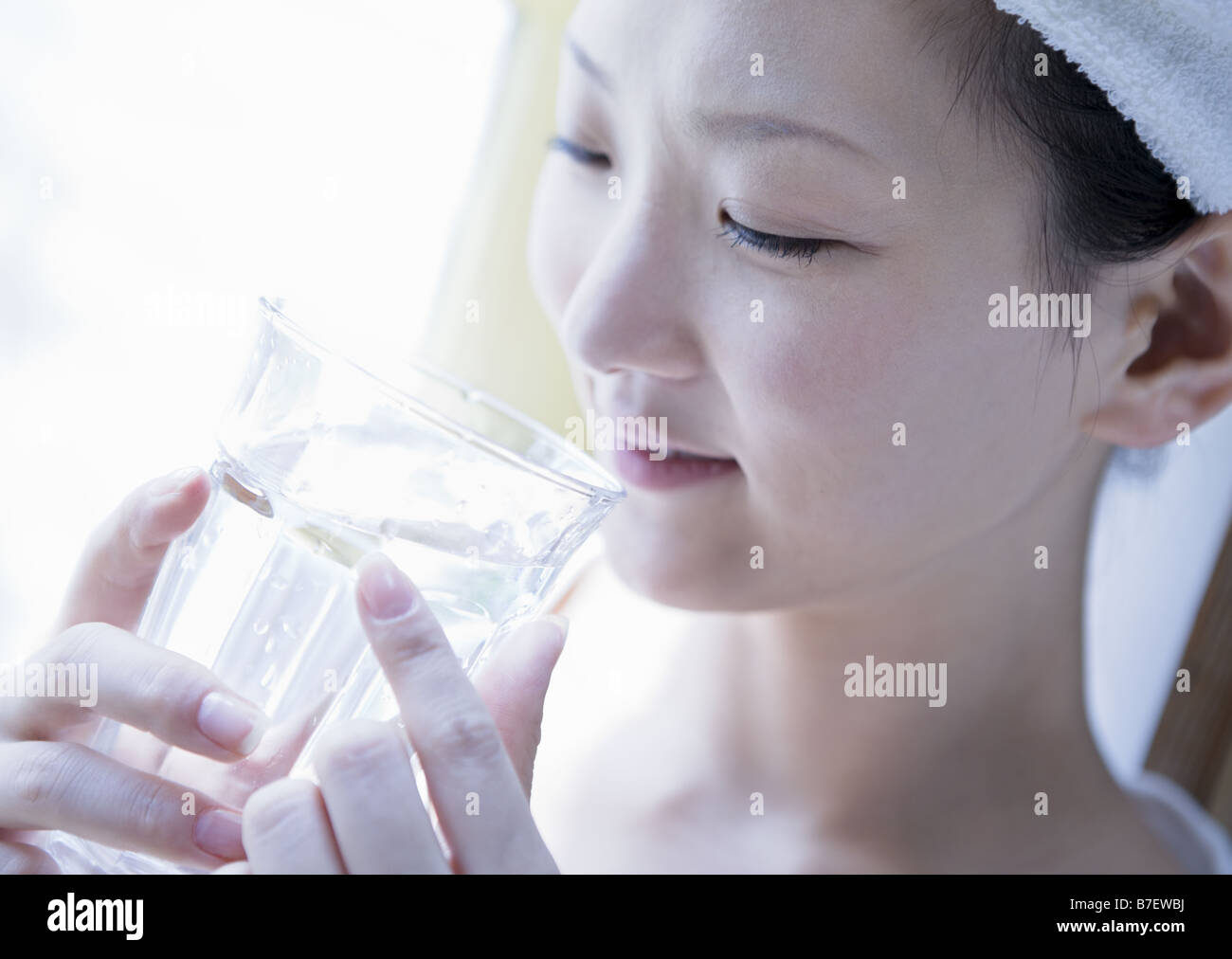 A woman drinking water Stock Photo - Alamy