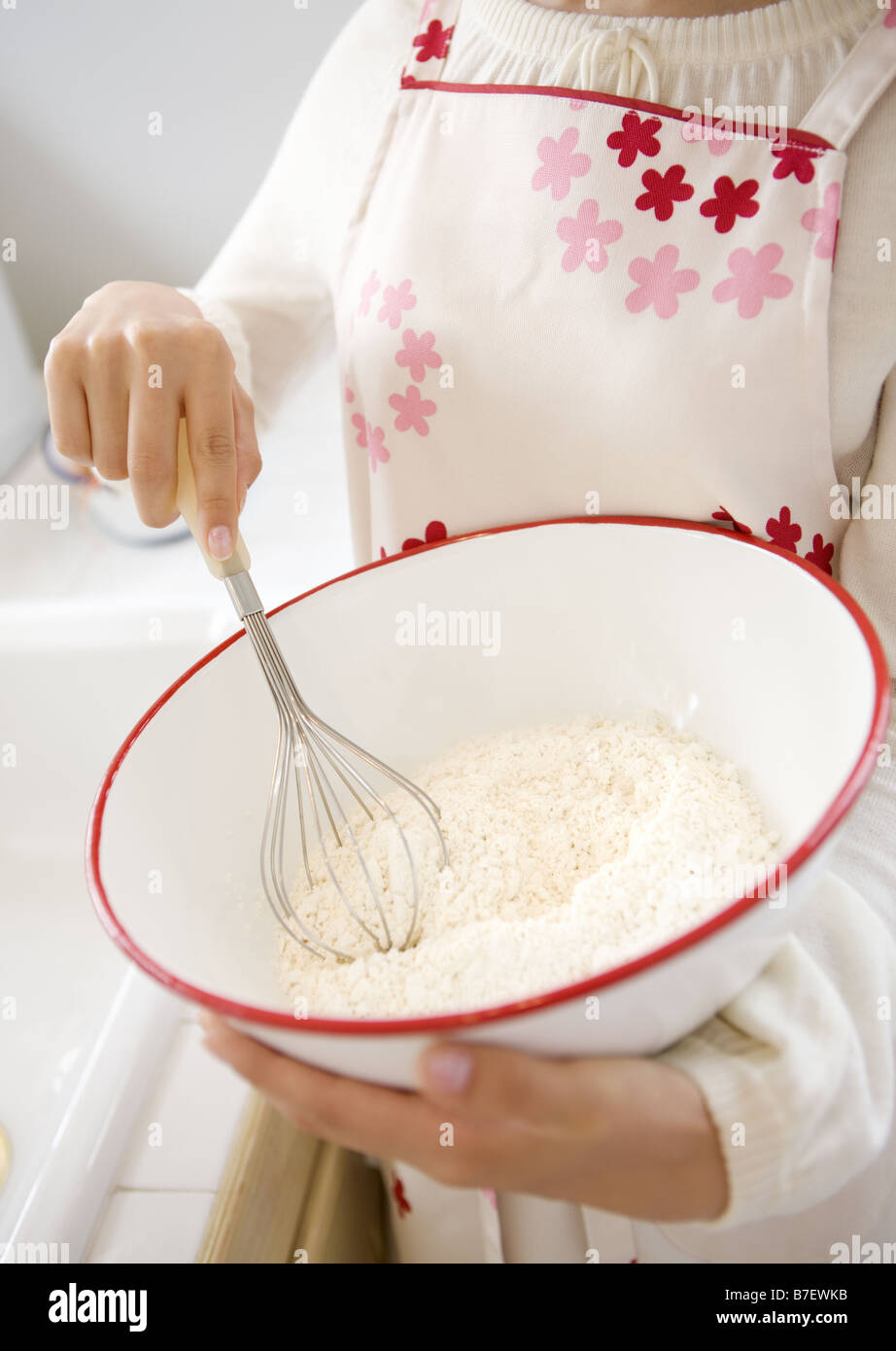 Woman's hands of making sweets Stock Photo - Alamy