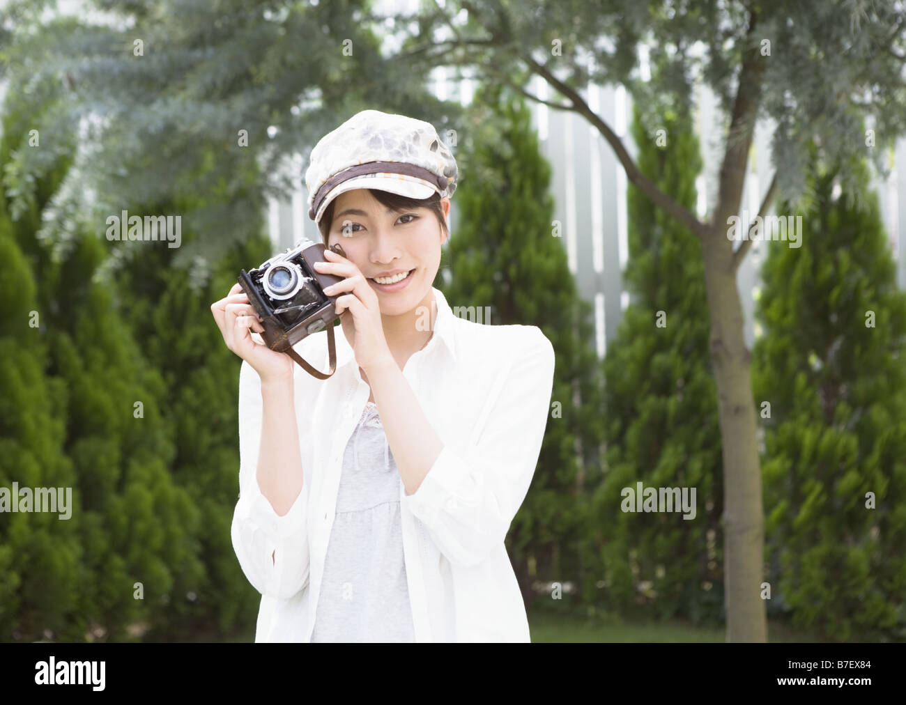 A woman taking pictures Stock Photo - Alamy