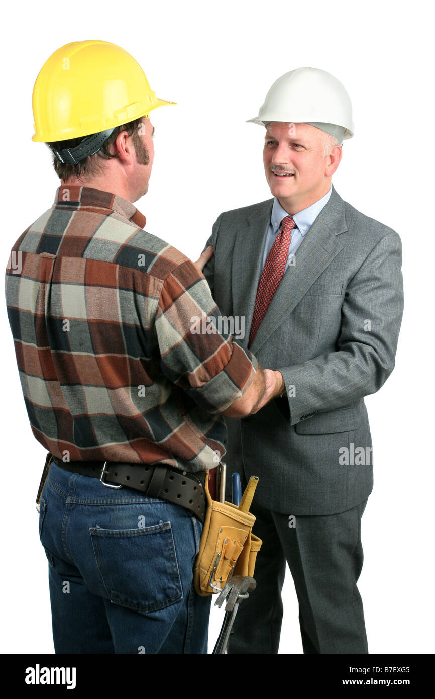 Two workers sharing a handshake hi-res stock photography and images - Alamy