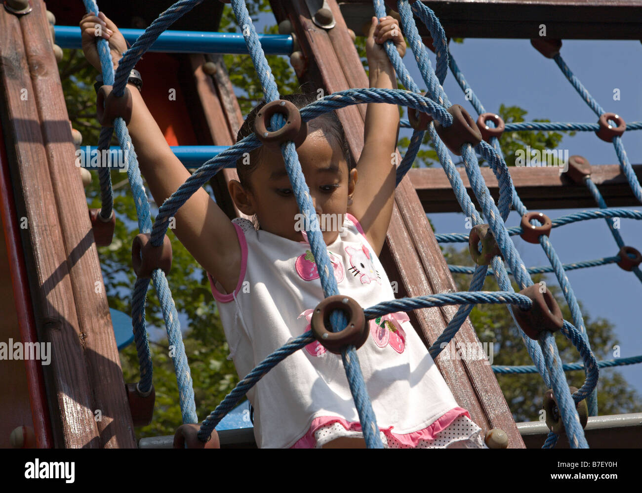 Children playing at playground Stock Photo - Alamy