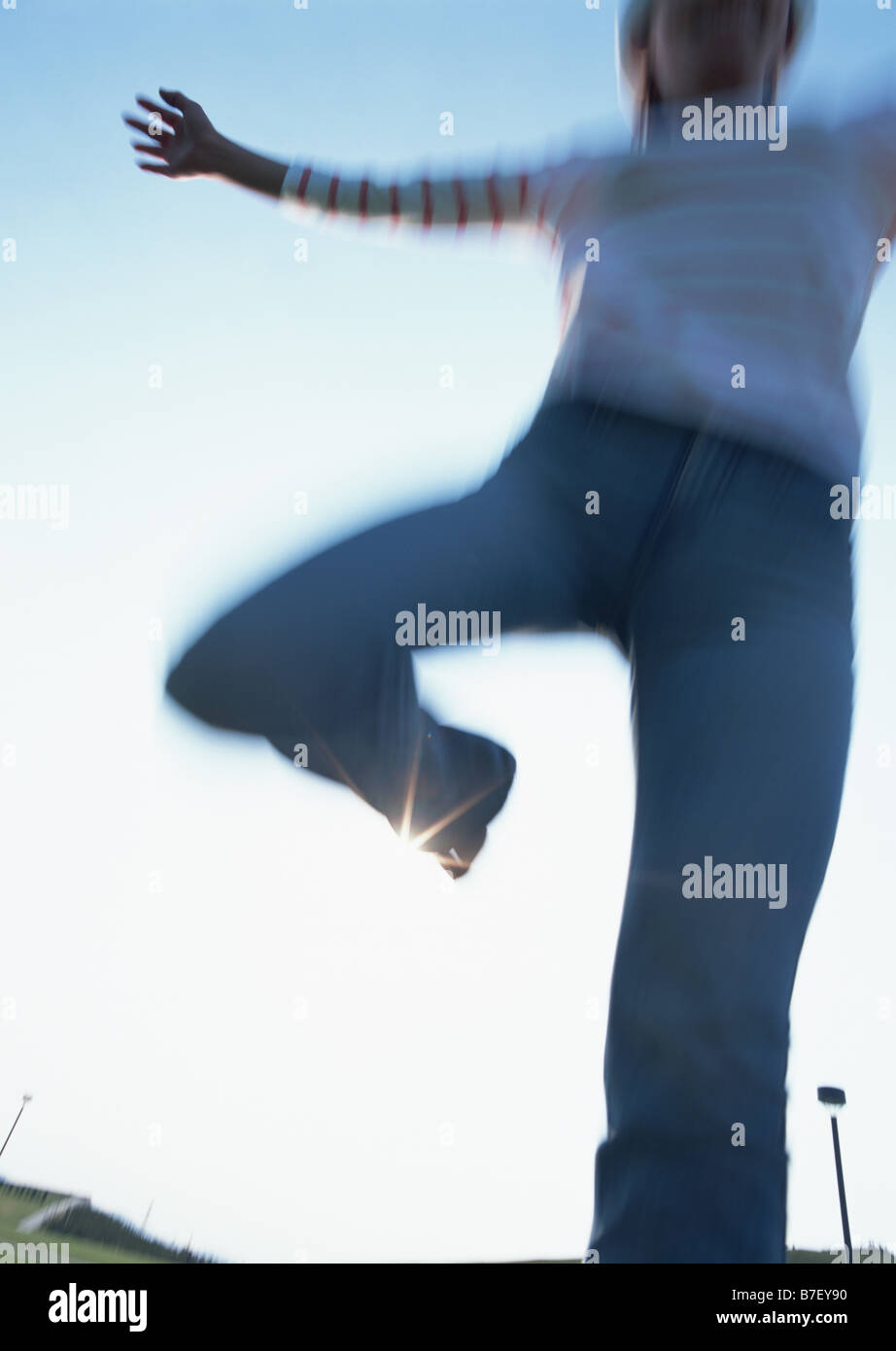 Cheerfully woman in field Stock Photo - Alamy