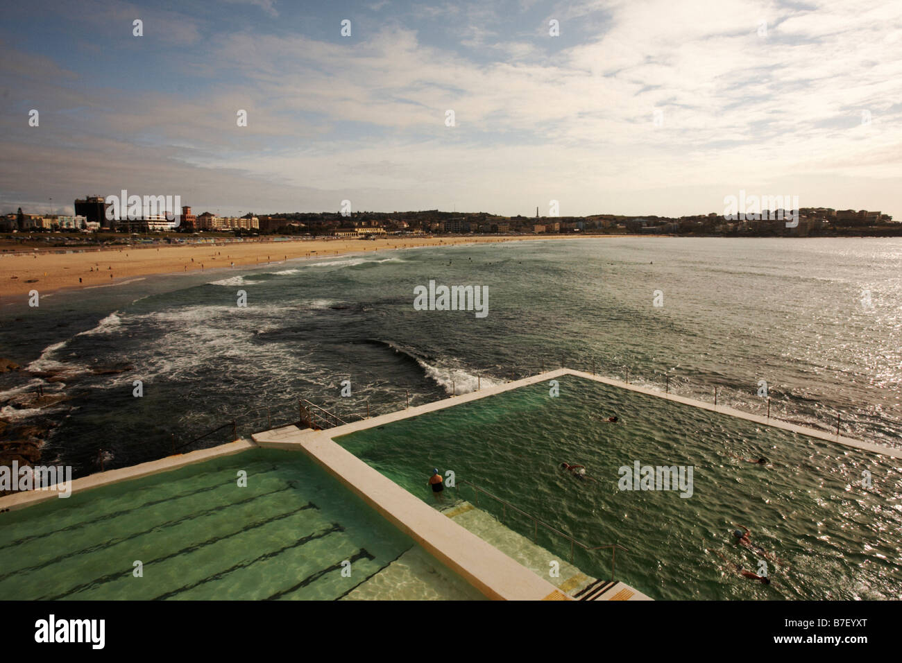 Pool of Bondi Icebergs overlooking coastline of Bondi Beach at sunrise ...