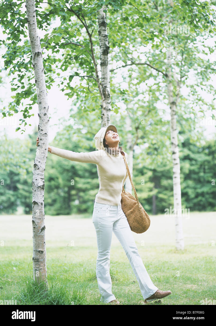 Woman and tree Stock Photo - Alamy