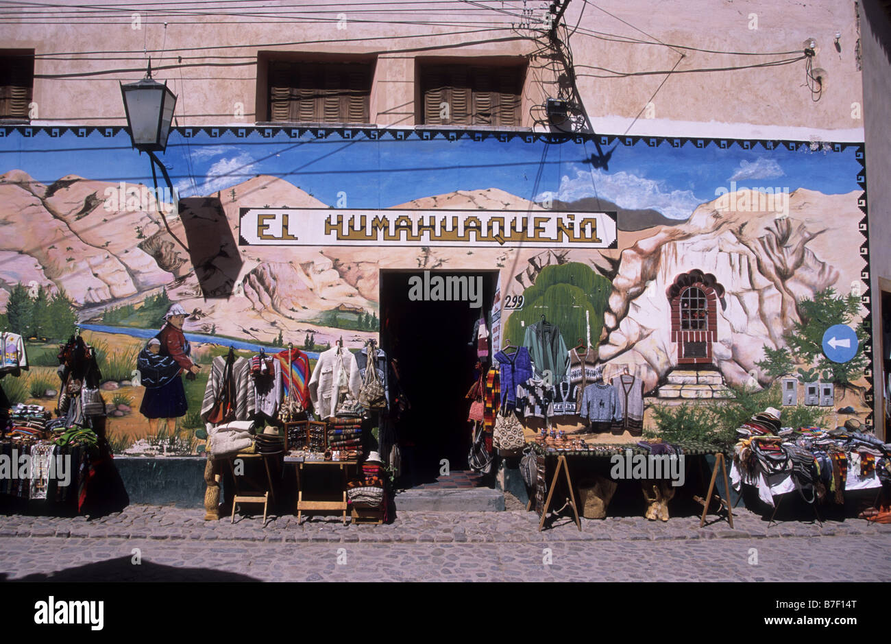 Mural on side of shop with souvenir stall, Humahuaca, Quebrada de ...