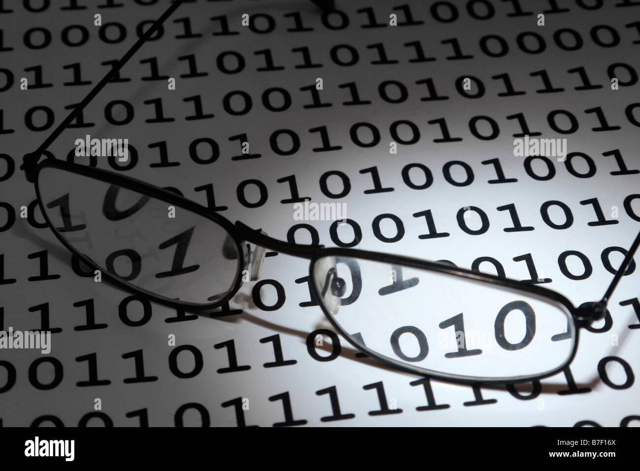 Glasses on binary background Stock Photo - Alamy