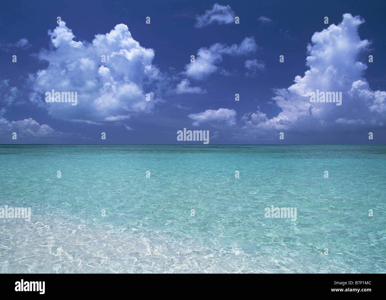 Shallow beach and sky Stock Photo - Alamy
