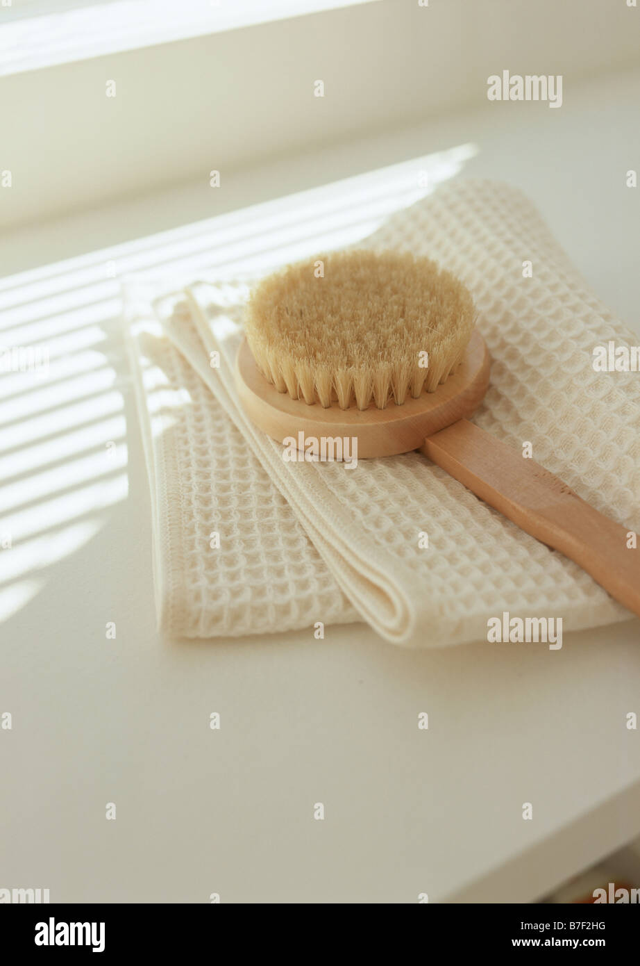Wood back brush and towel Stock Photo - Alamy