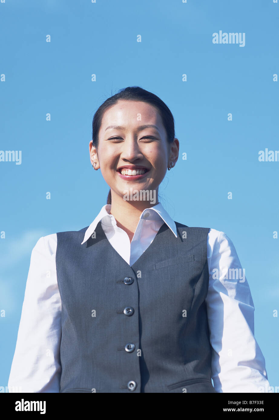 Business woman in corporate uniform Stock Photo - Alamy
