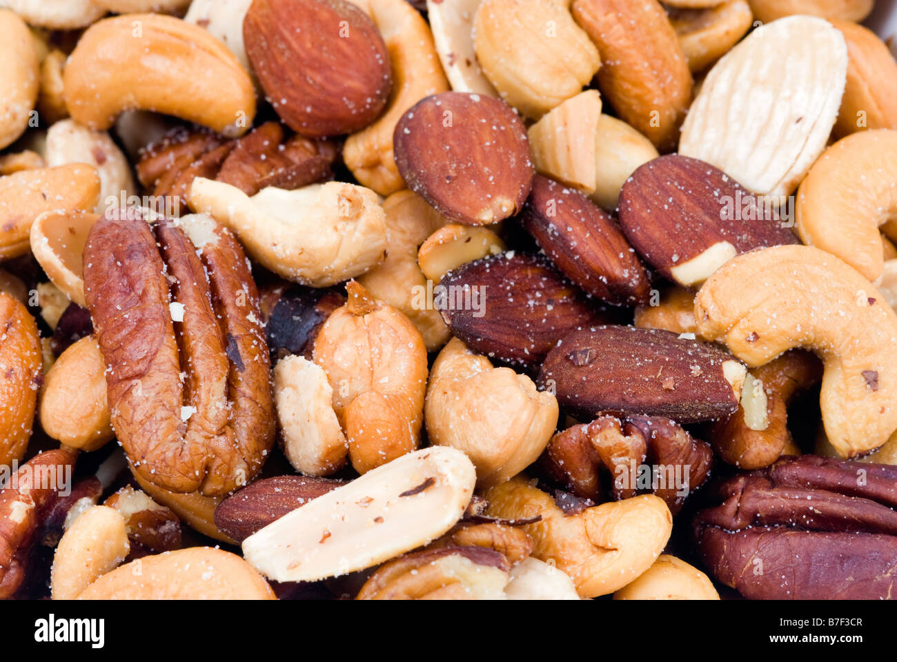 fresh mixed nuts and fruit for backgrounds Stock Photo - Alamy