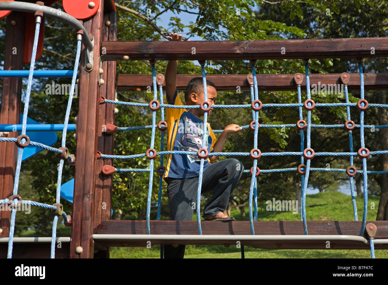 Children playing at playground Stock Photo - Alamy