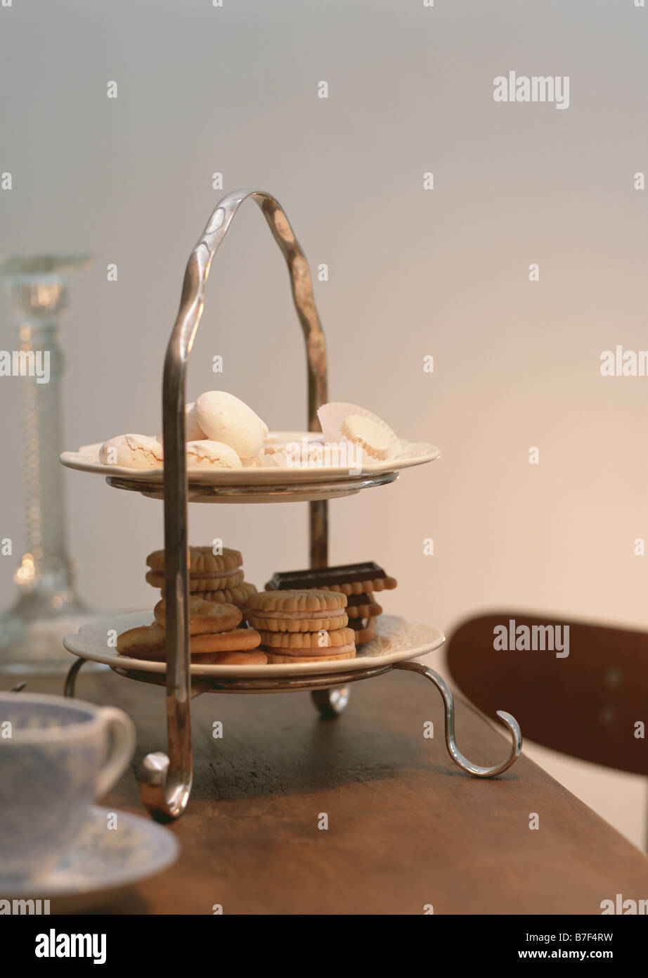 Double-tier cakestand and cookies Stock Photo - Alamy