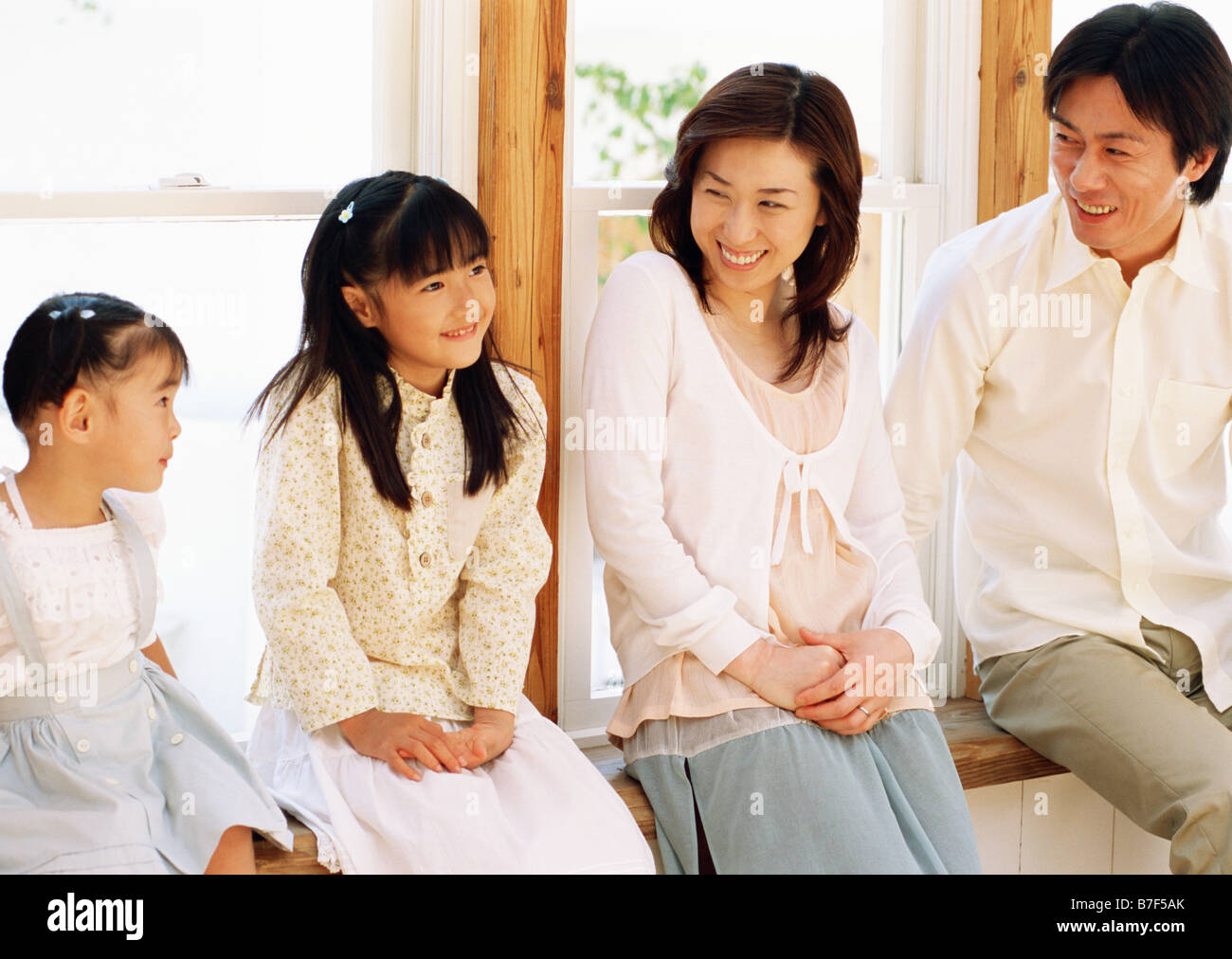 Four family discuss hi-res stock photography and images - Alamy