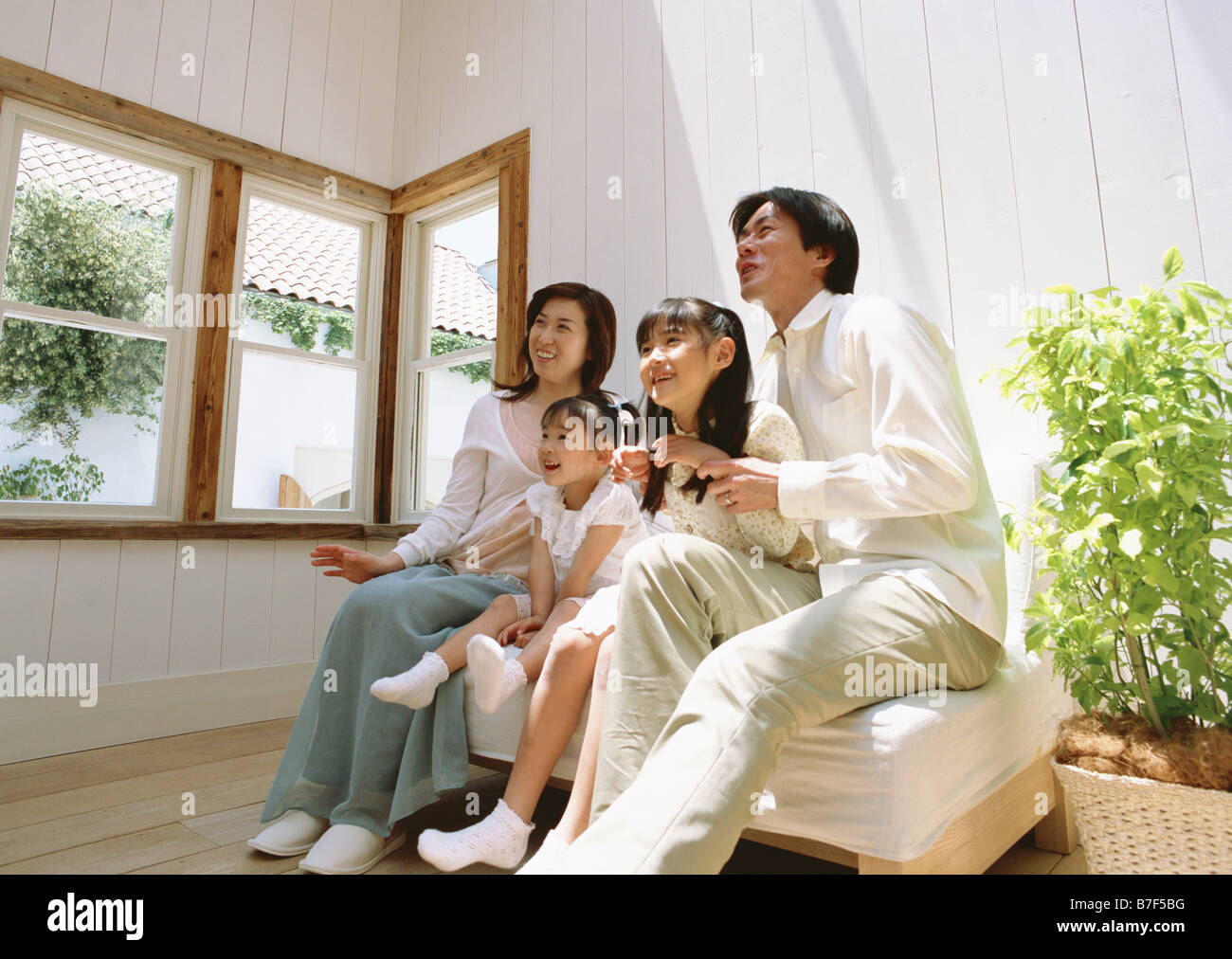 Four family discuss hi-res stock photography and images - Alamy