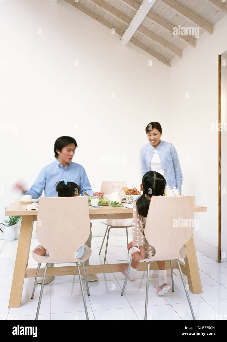 Four family discuss hi-res stock photography and images - Alamy