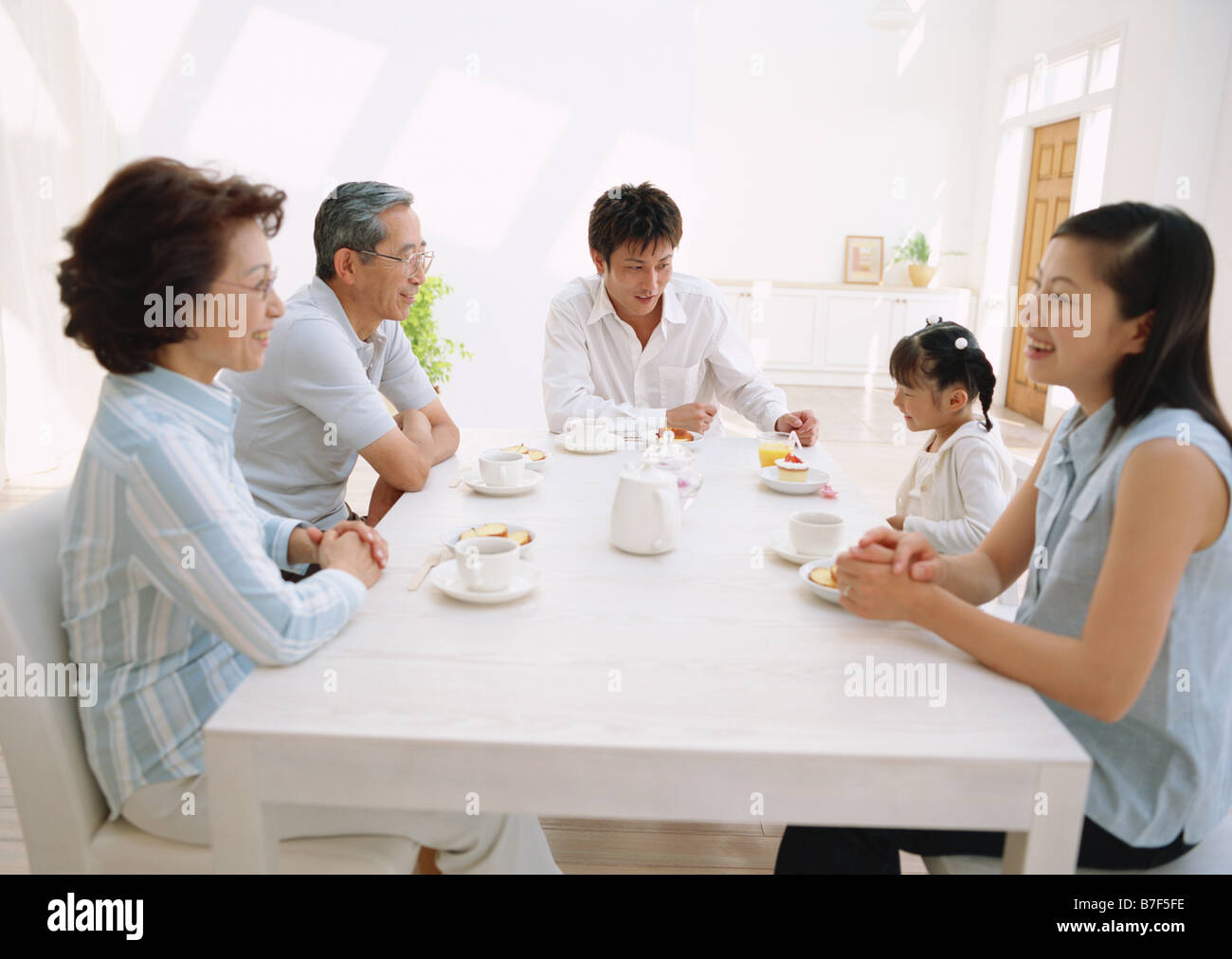 Multi-generation family get-together Stock Photo - Alamy