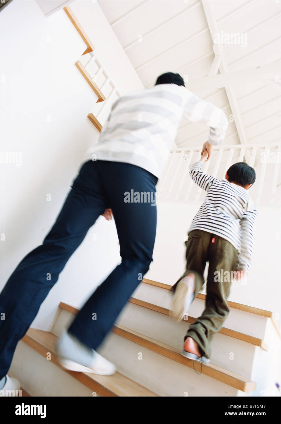 Image of going up stairs Stock Photo - Alamy
