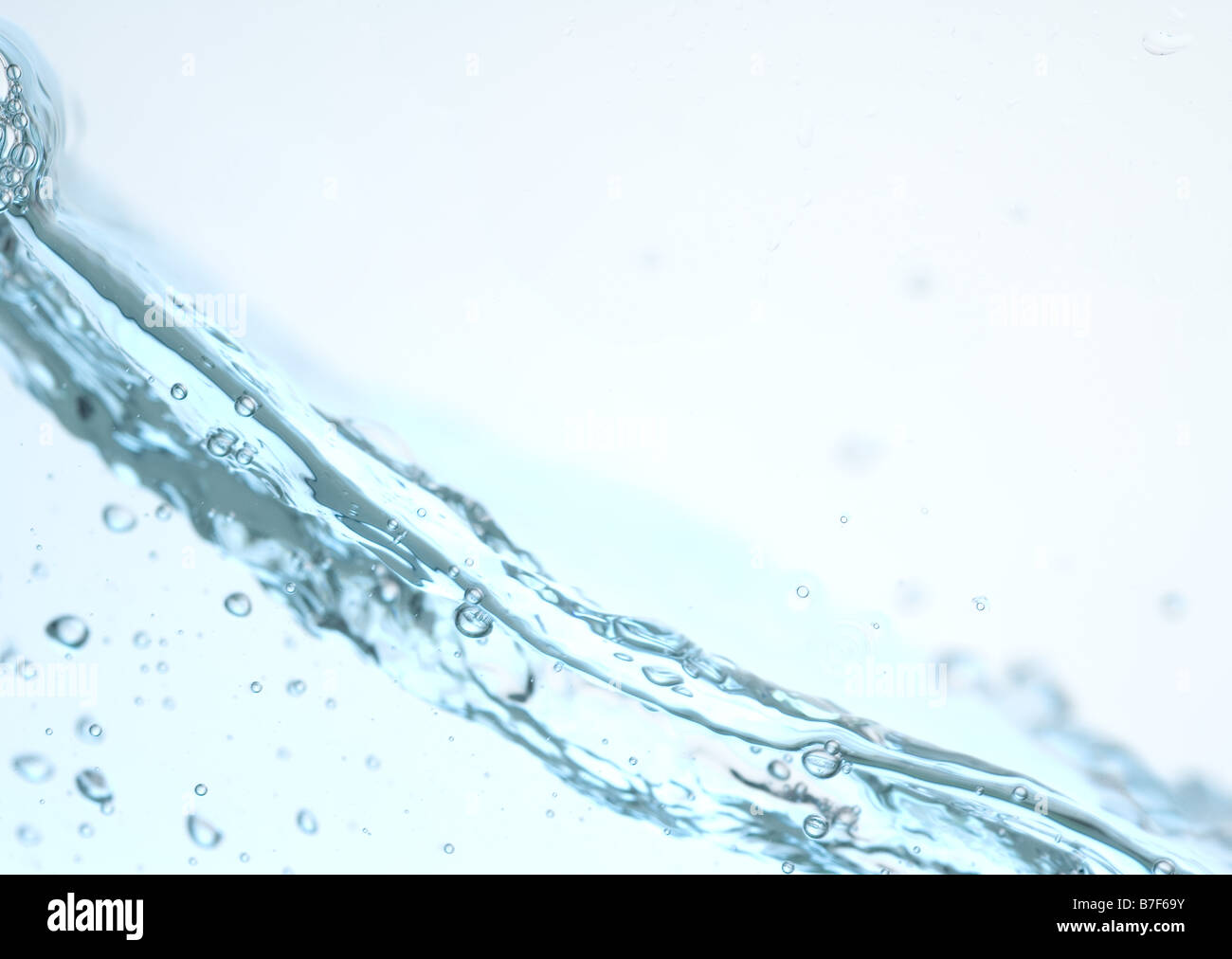 Wave motion and water bubbles Stock Photo - Alamy