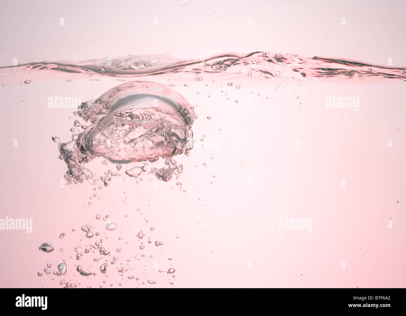 Wave motion and water bubbles Stock Photo - Alamy