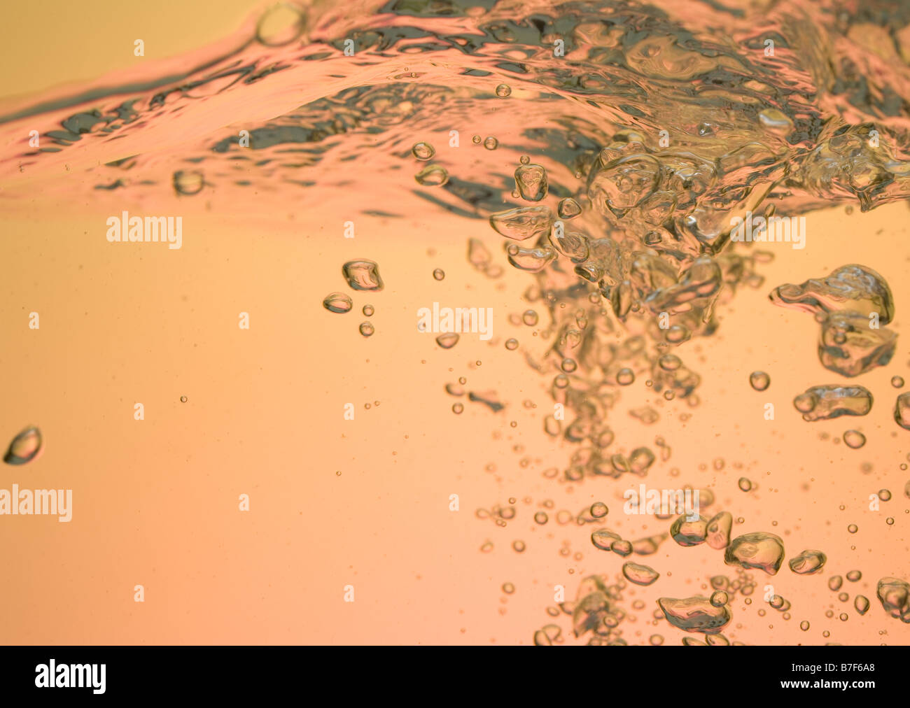 Wave motion and water bubbles Stock Photo - Alamy