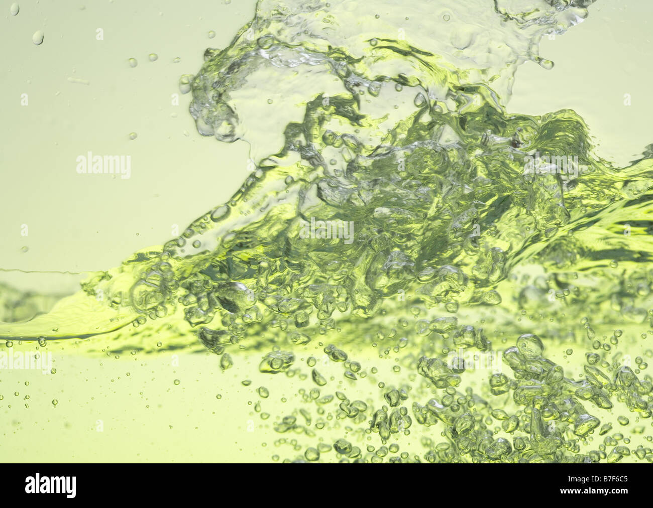 Wave motion and water bubbles Stock Photo - Alamy