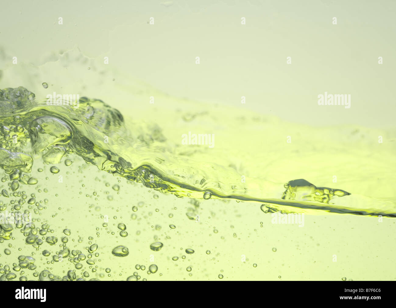 Wave motion and water bubbles Stock Photo - Alamy