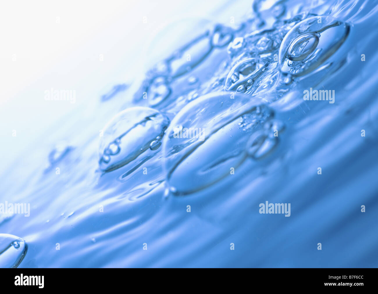 Bubbles on water surface Stock Photo - Alamy