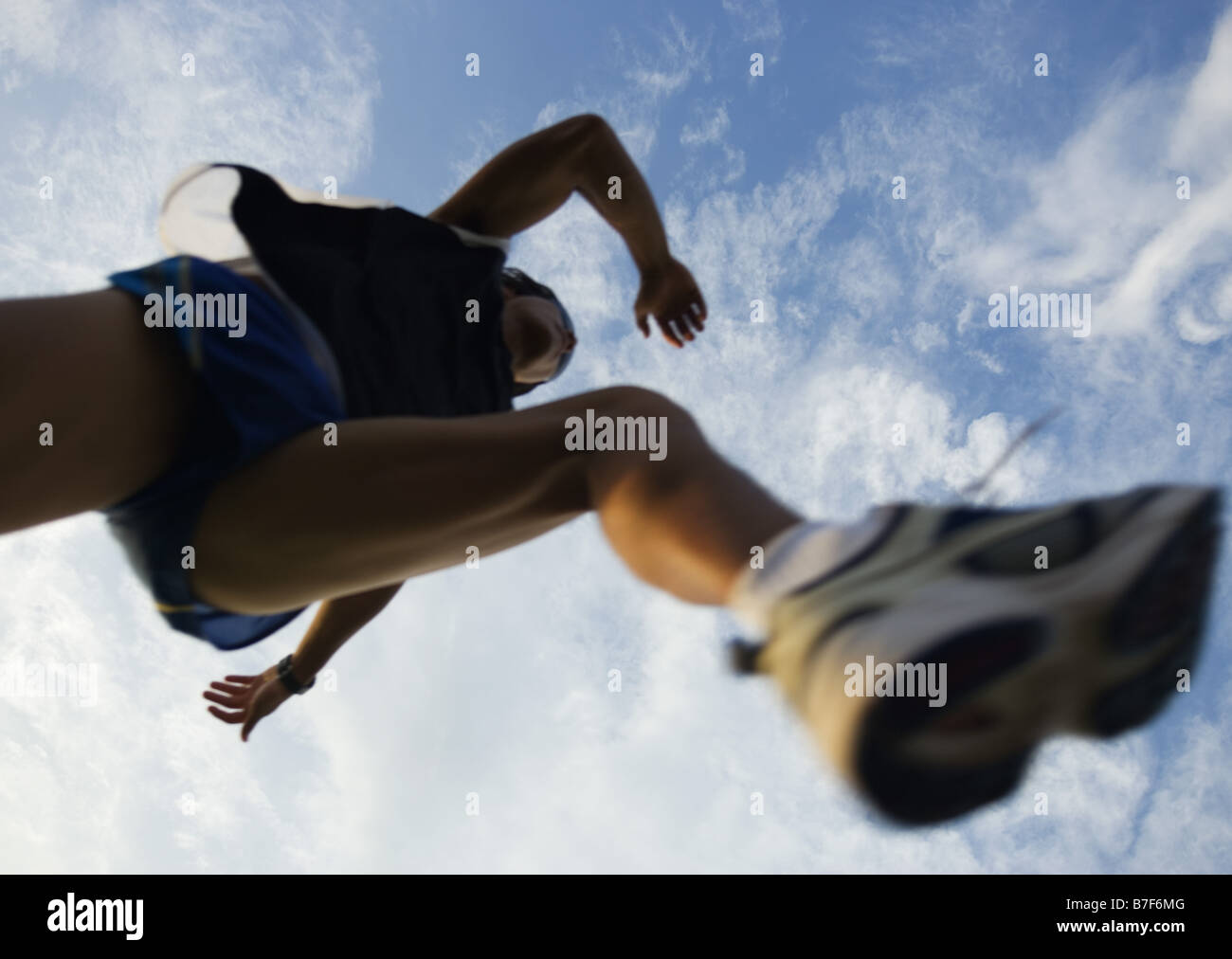 Male athlete jump sleeves hi-res stock photography and images - Alamy
