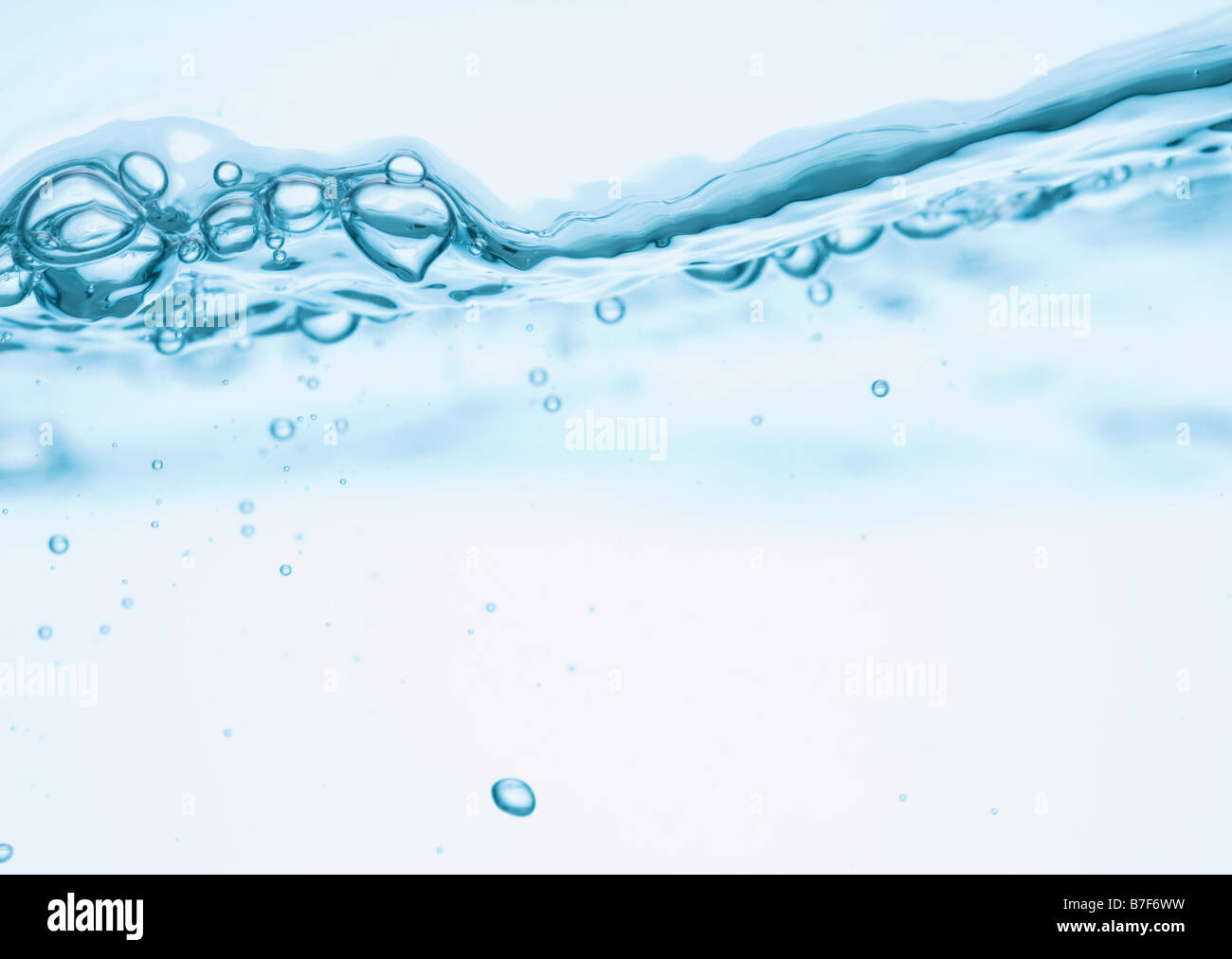 Wave motion and water bubbles Stock Photo - Alamy