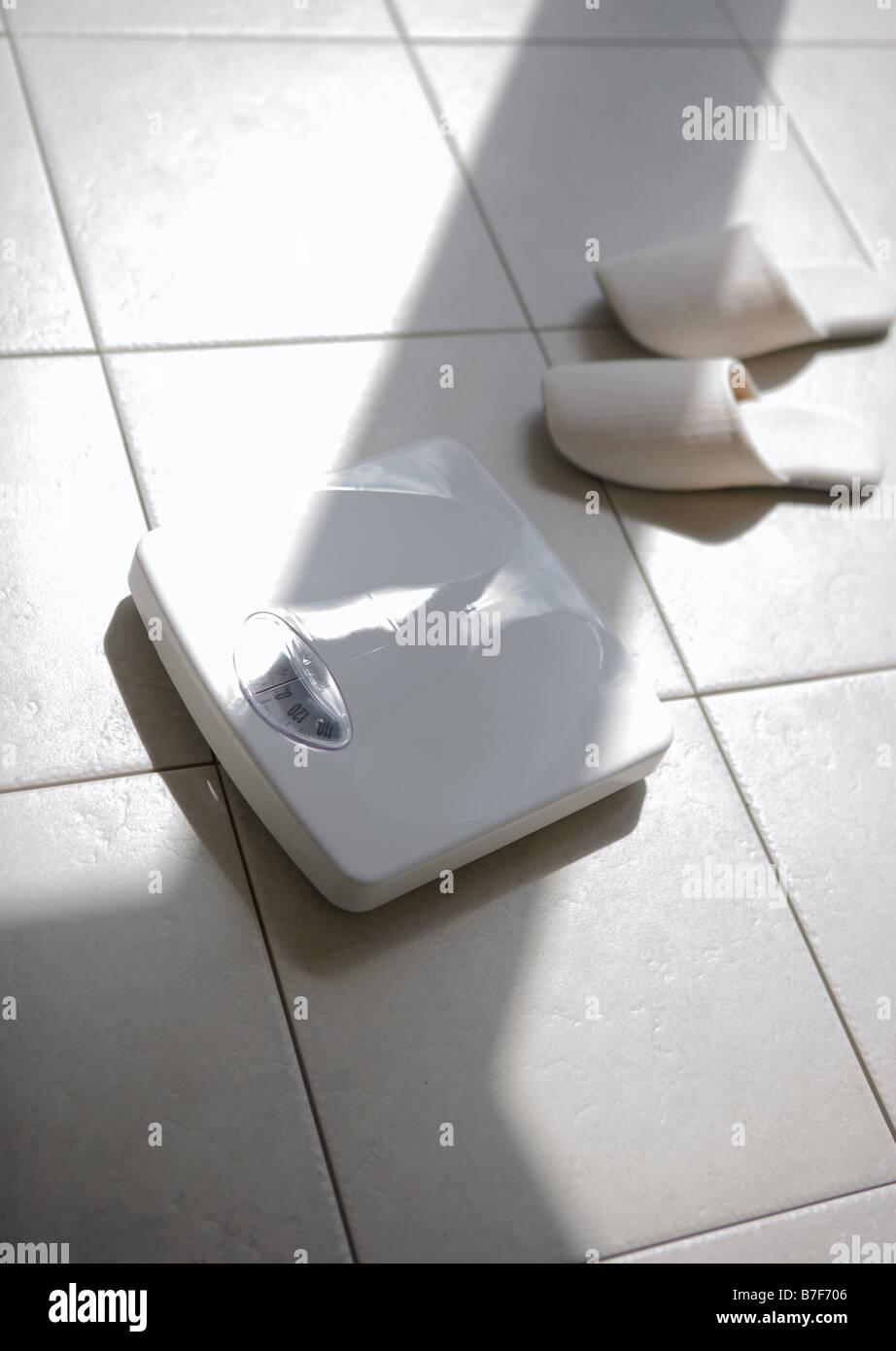 Weight scale and slippers Stock Photo - Alamy