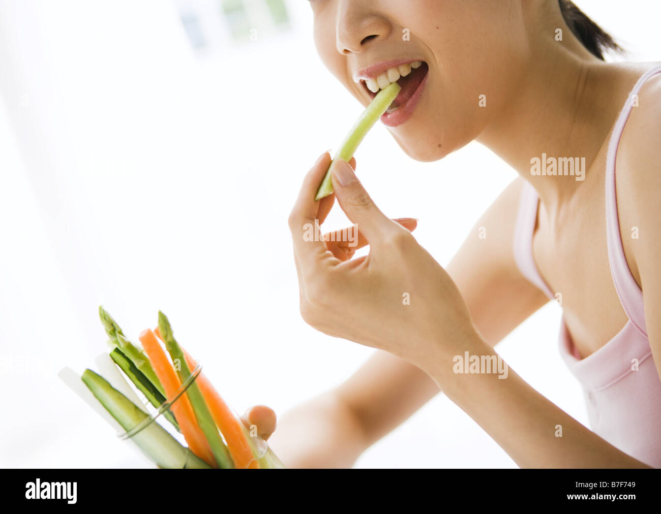 Woman carrot sticks hi-res stock photography and images - Alamy