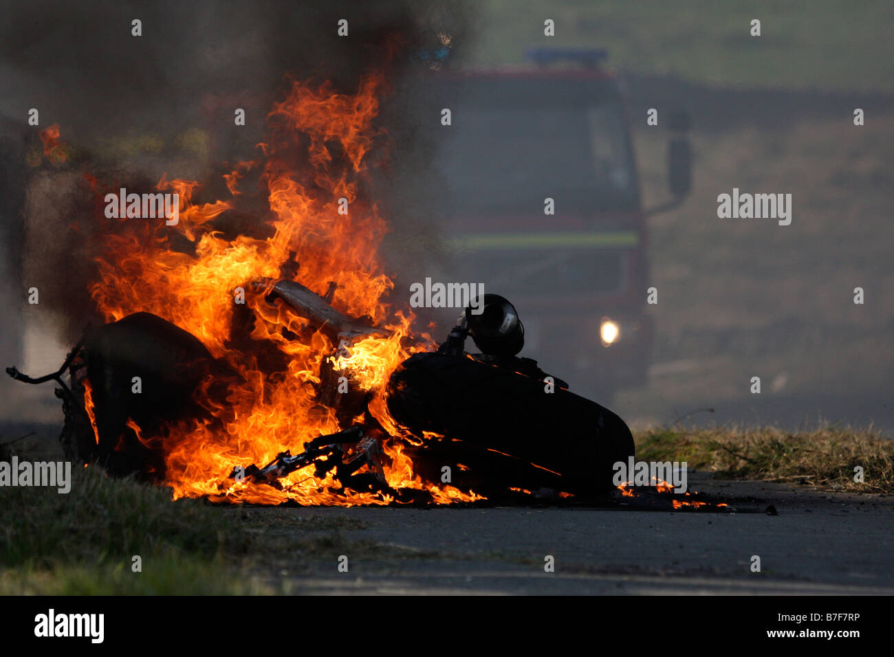 Motorcycle fire with Fire Engine Stock Photo - Alamy