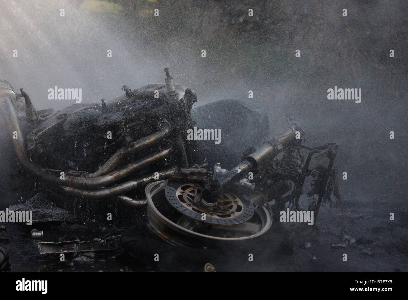 Burnt out motorcycle Stock Photo - Alamy