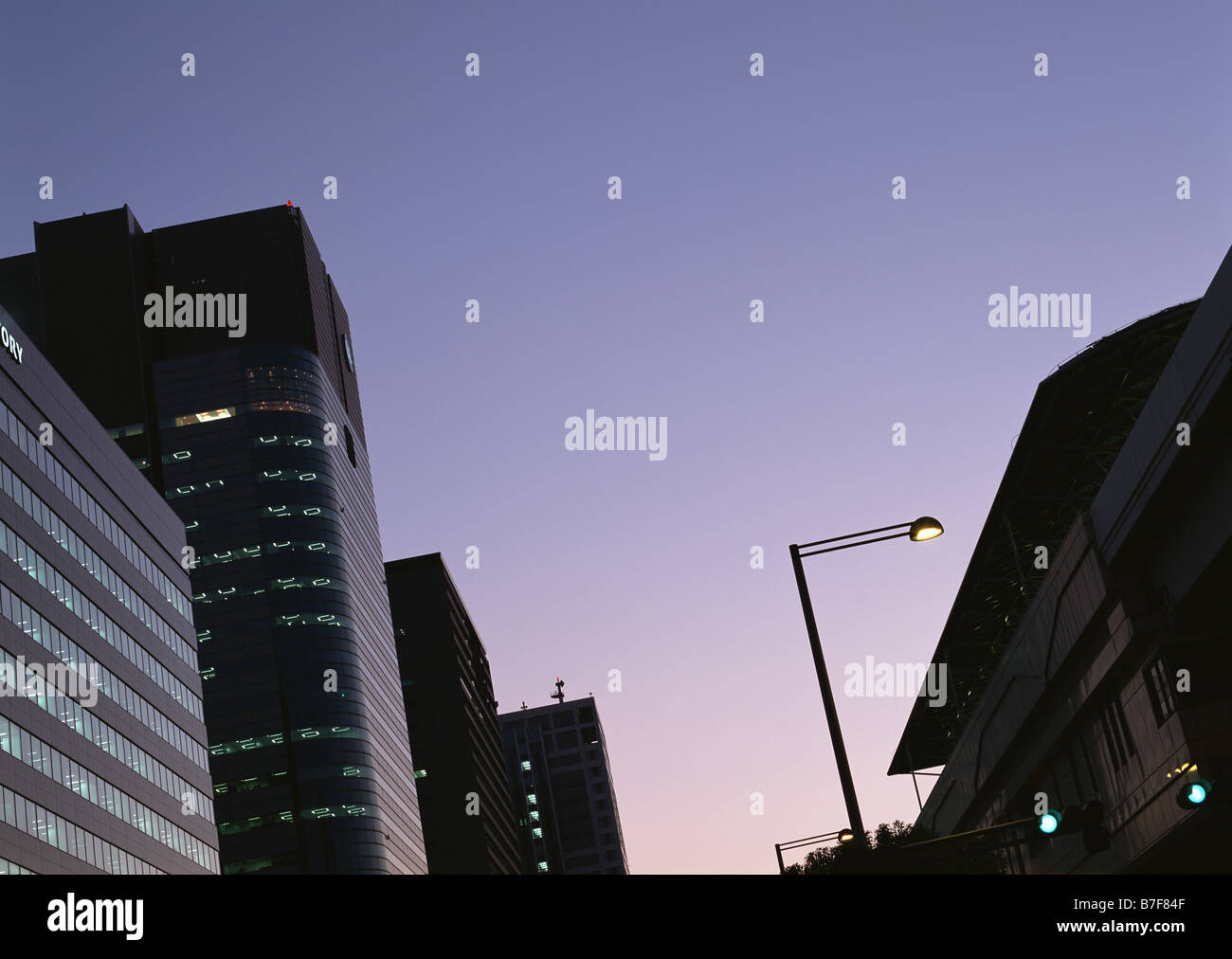 View of office building at dusk Stock Photo - Alamy
