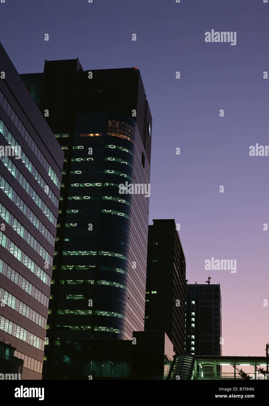 View of office building at dusk Stock Photo - Alamy