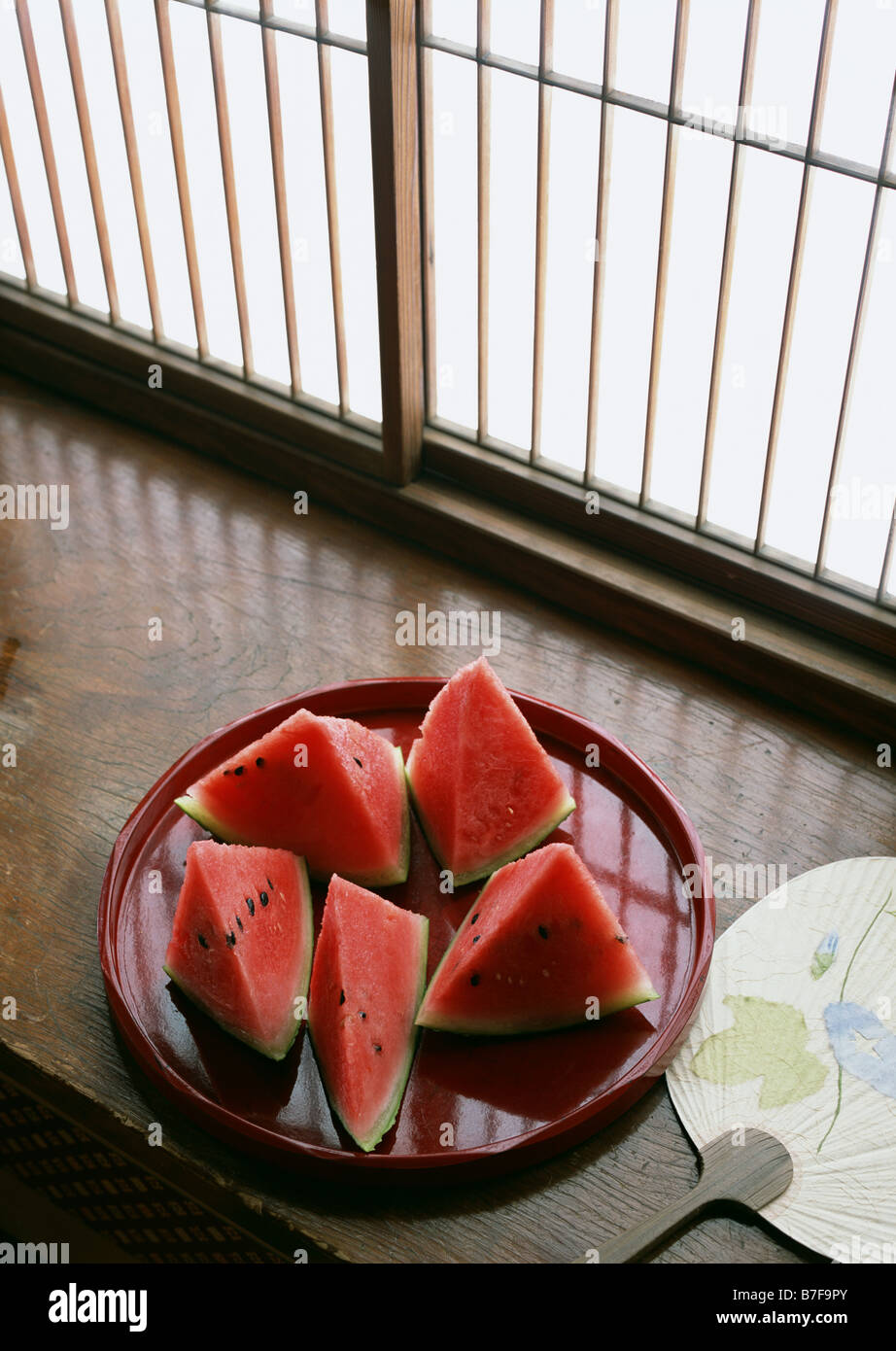 Sliced watermelon by window Stock Photo - Alamy