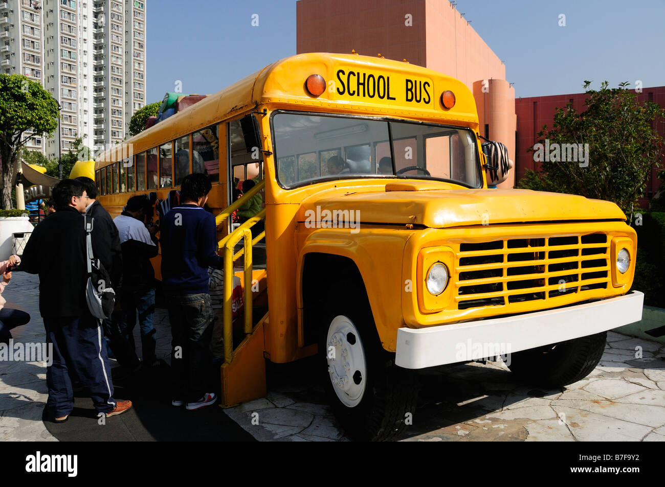 School bus in playground Stock Photo - Alamy