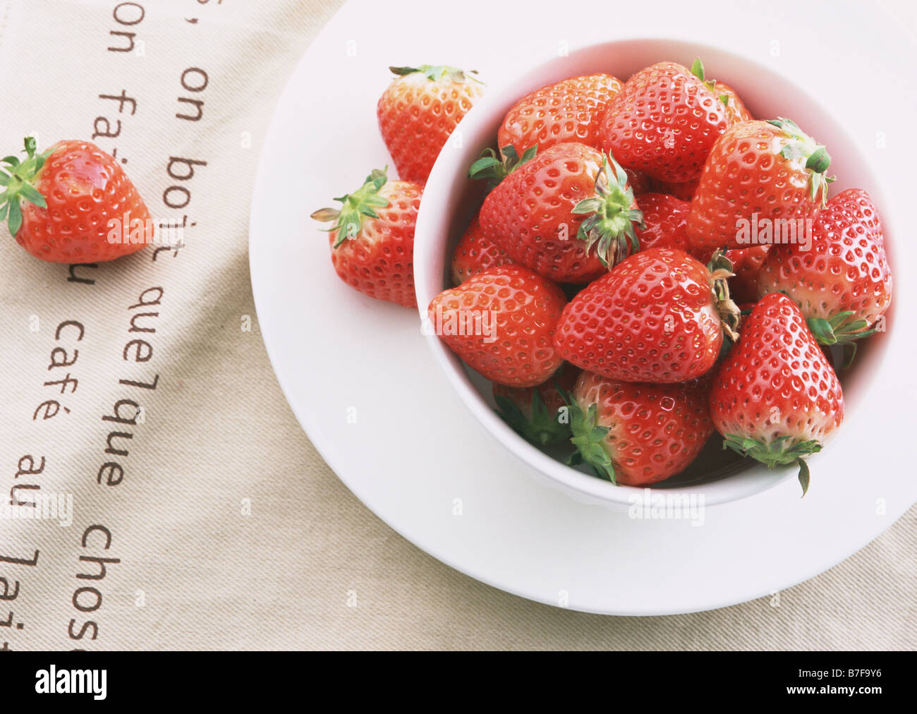 Strawberries in bowl Stock Photo - Alamy
