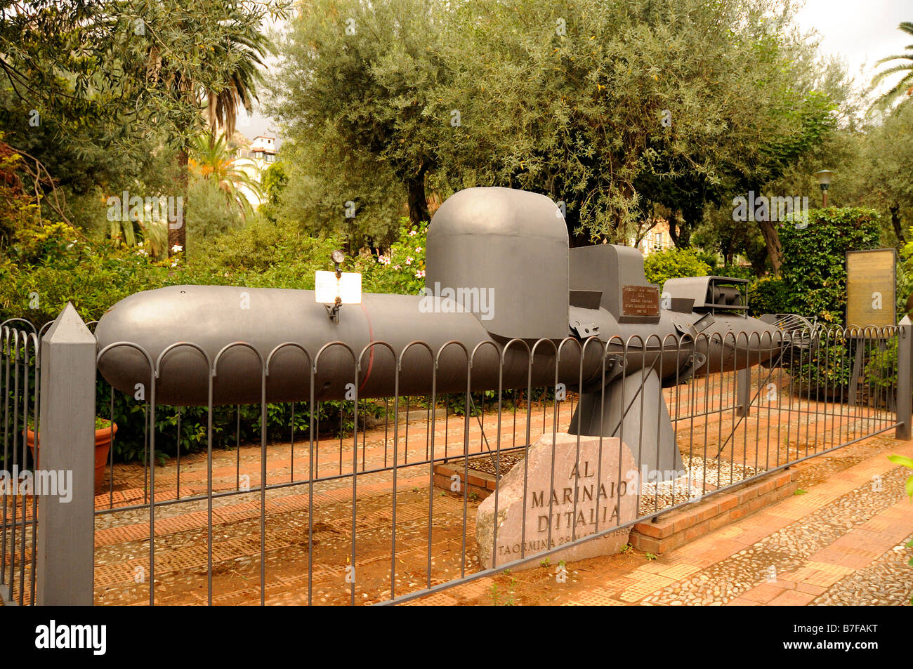 The War Memorial in the Taormina Public Gardens with an Italian mini ...